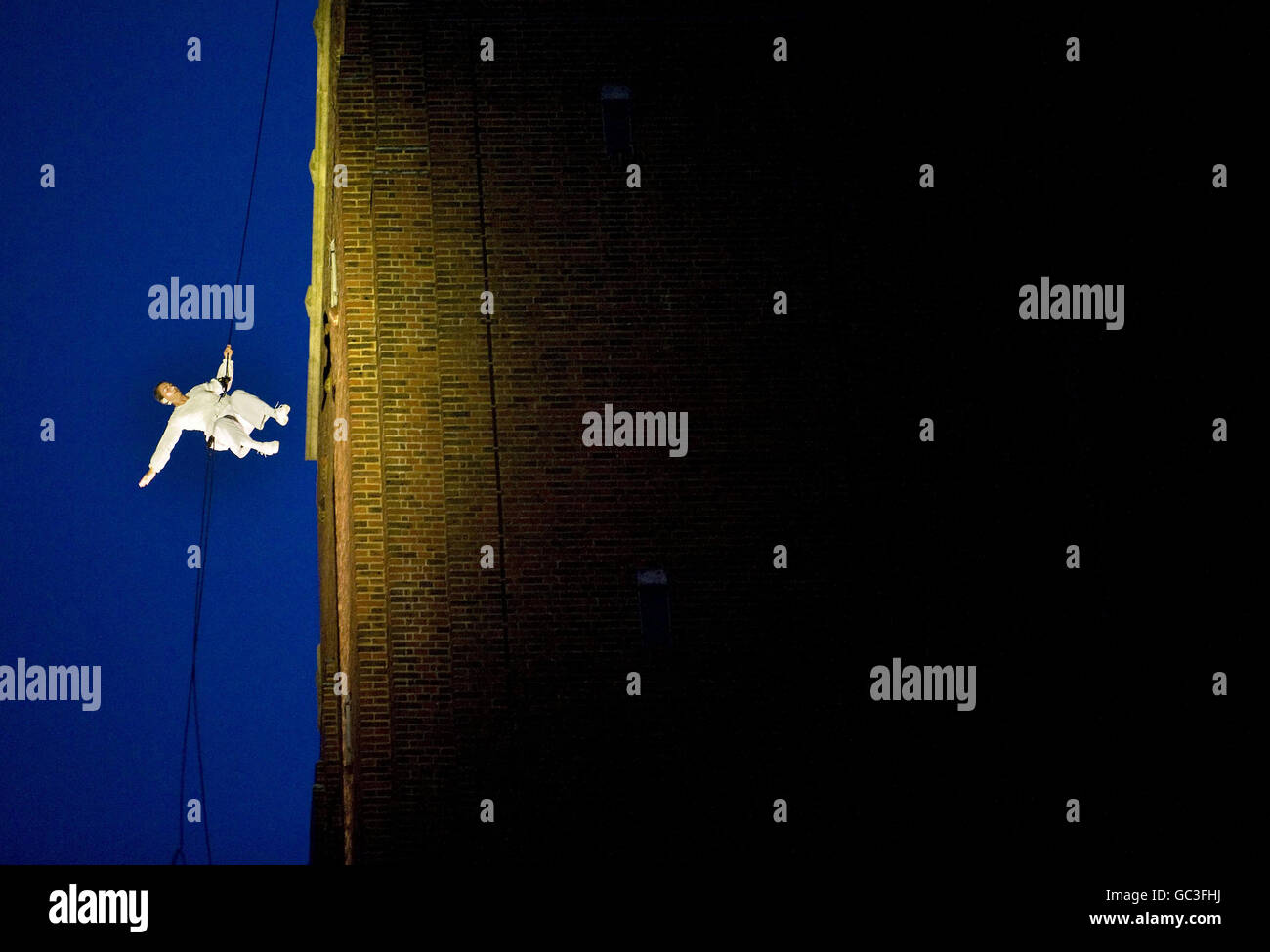 Dancer Kate Lawrence performs a vertical dance, as new illuminations ...