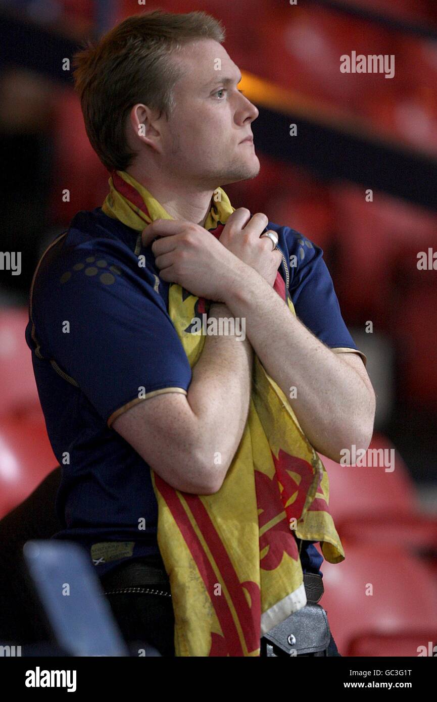 A dejected Scotland fan in the stands after the final whistle Stock ...