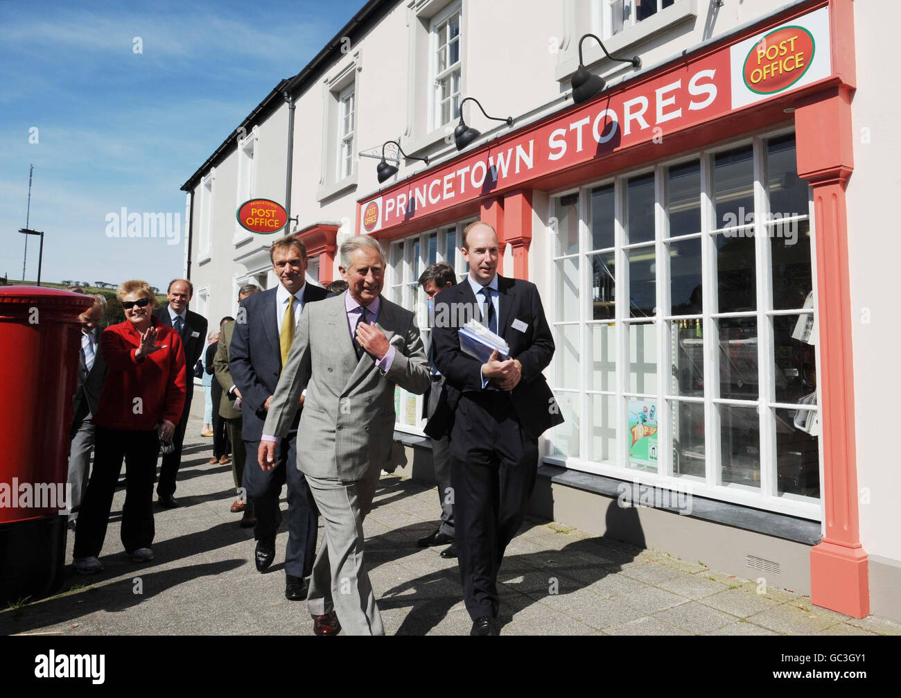 Prince of Wales with Tom Stratton of the Duchy of Cornwall walks past ...