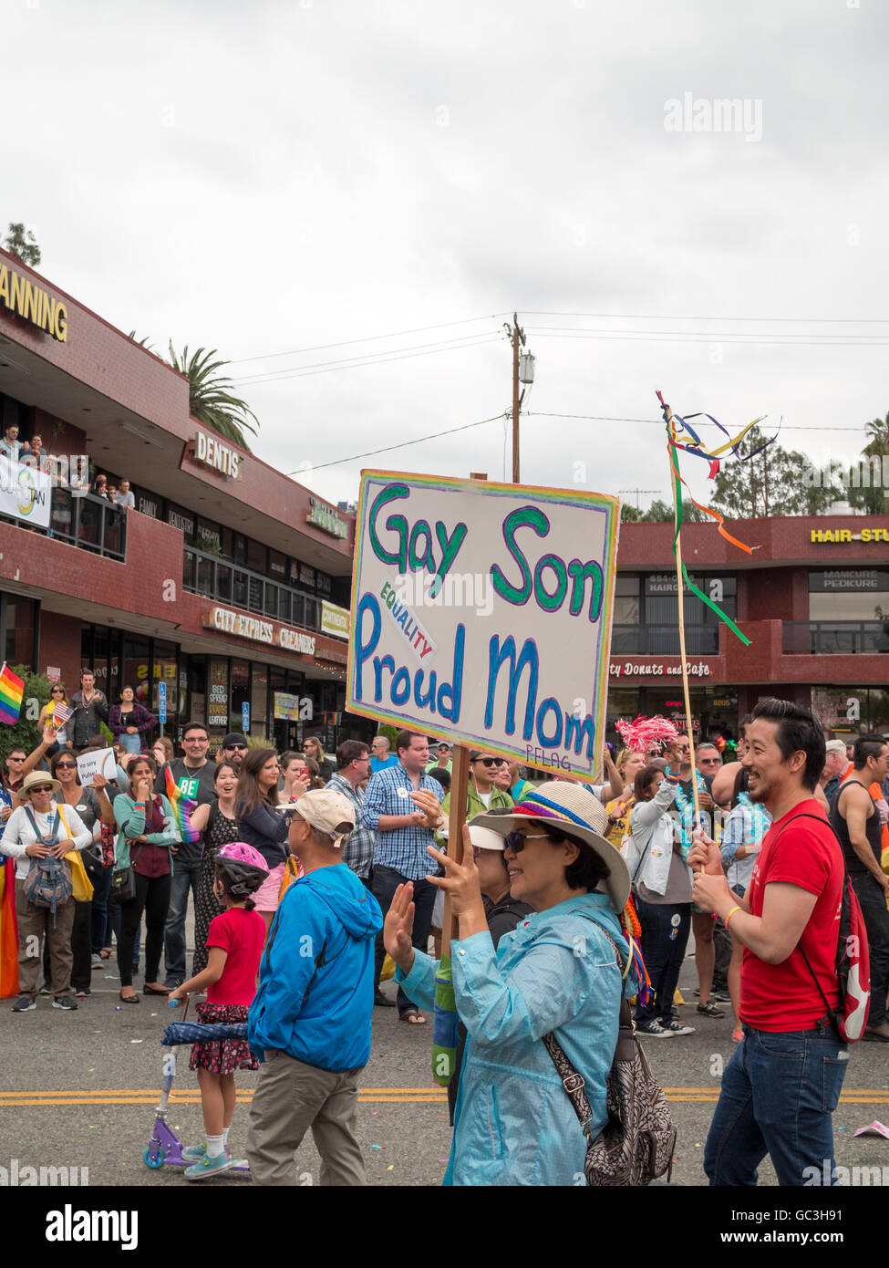 "Gay son proud mom" poster hold by a woman in LA Pride Parade 2016 ...