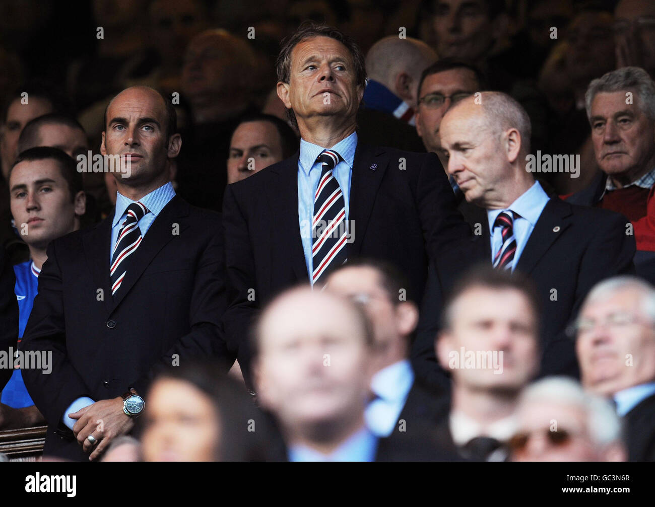 The new Rangers chairman Alastair Johnston (centre) watches from the ...