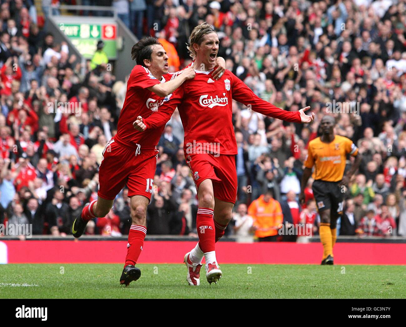 Liverpool's Fernando Torres (centre) celebrates scoring his sides ...