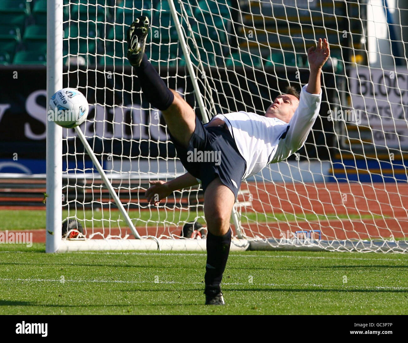 Schools Minister Ed Balls warms up prior to the Labour MPs Vs Press ...