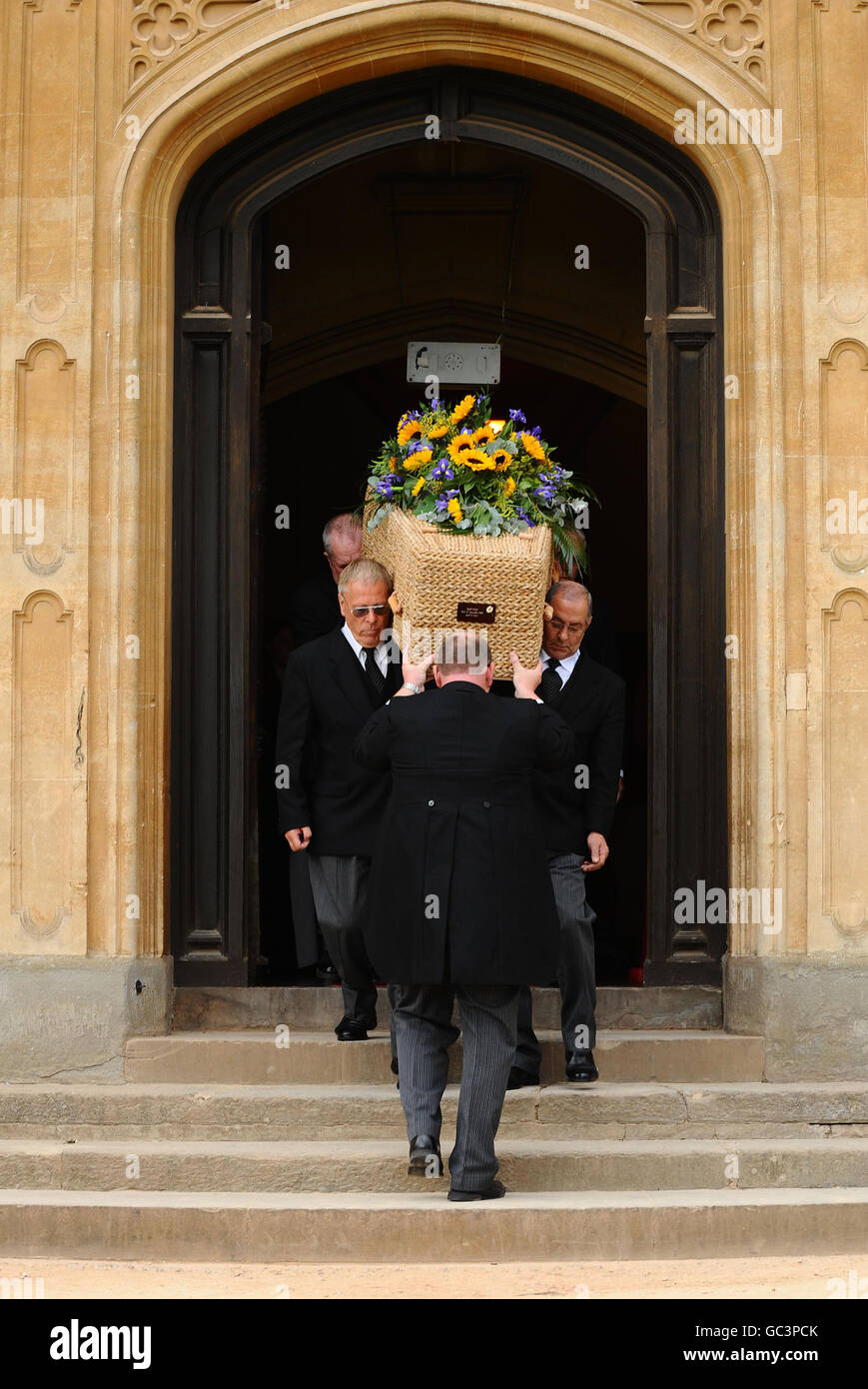 The coffin of TV chef Keith Floyd is carried out after his funeral at ...