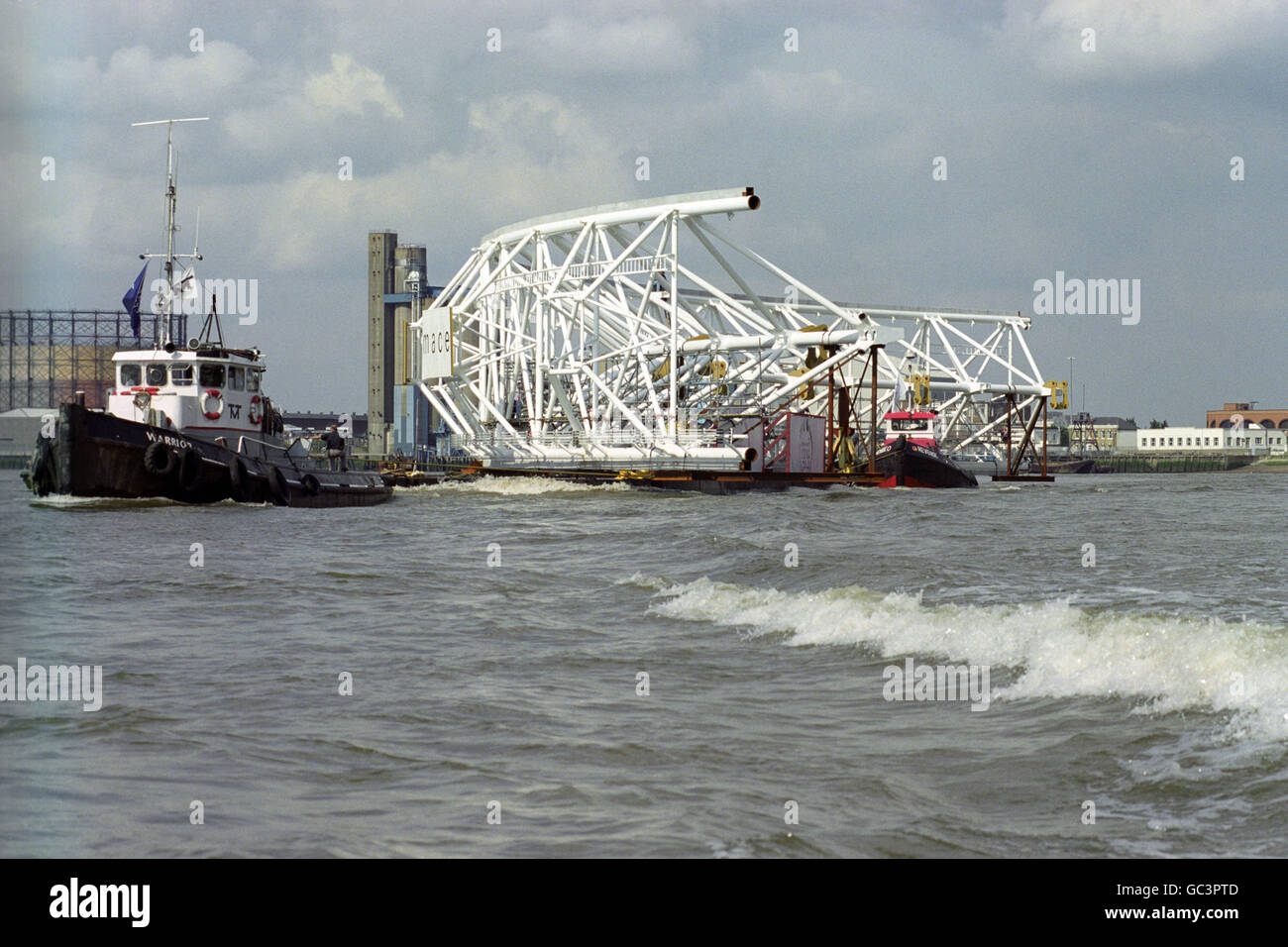A quarter of the massive observation wheel's steel rim gets towed down ...