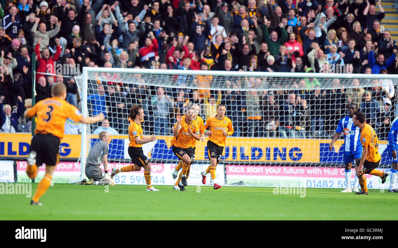 Centre celebrates goal with hull team mates hi-res stock photography ...