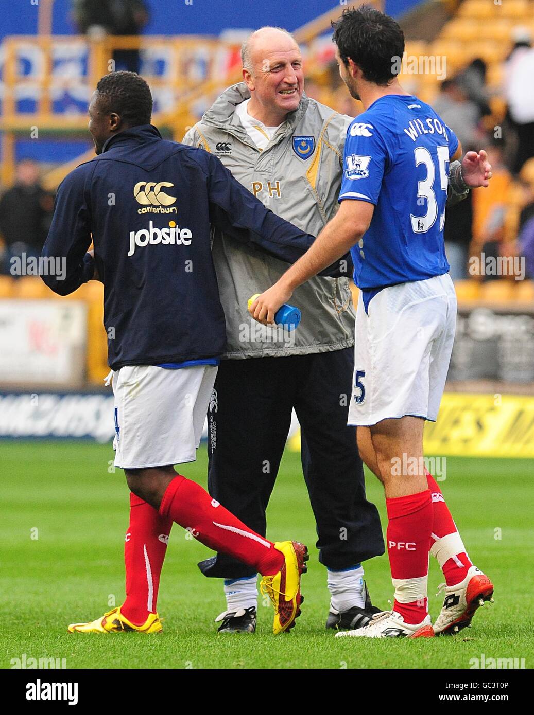 Portsmouth manager Paul Hart (centre) celebrates their victory with ...