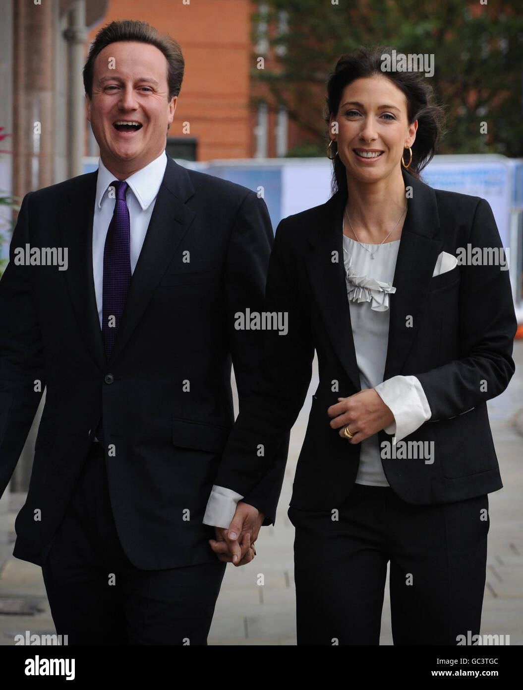 Half length mid top arrive arriving hands in walking england hi-res ...