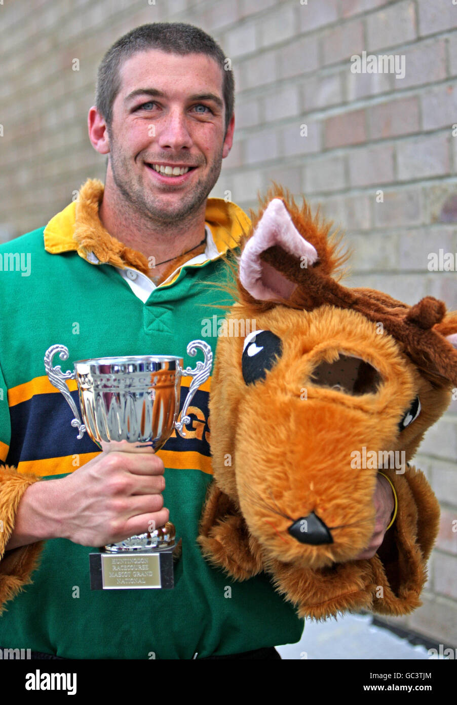 Celebrates after winning the grand national at huntingdon race course ...