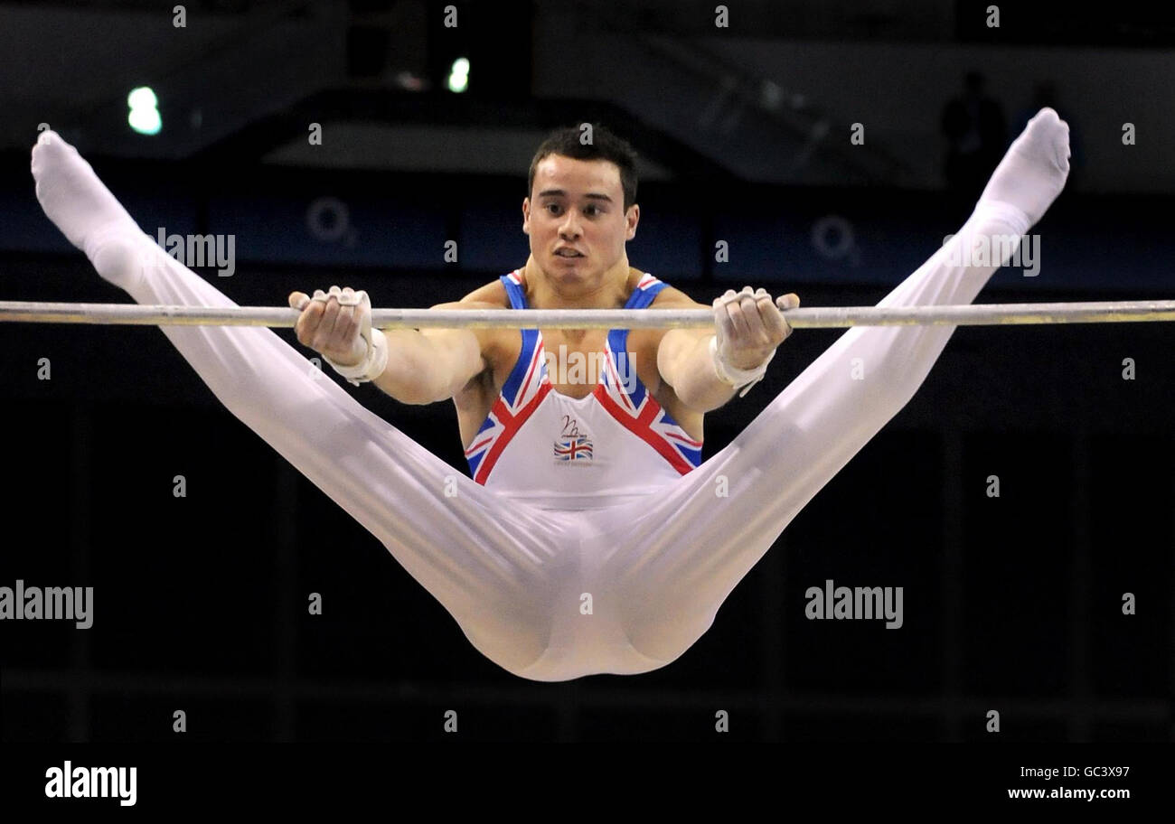 Great Britain's Kristian Thomas competes on the high bar during the ...