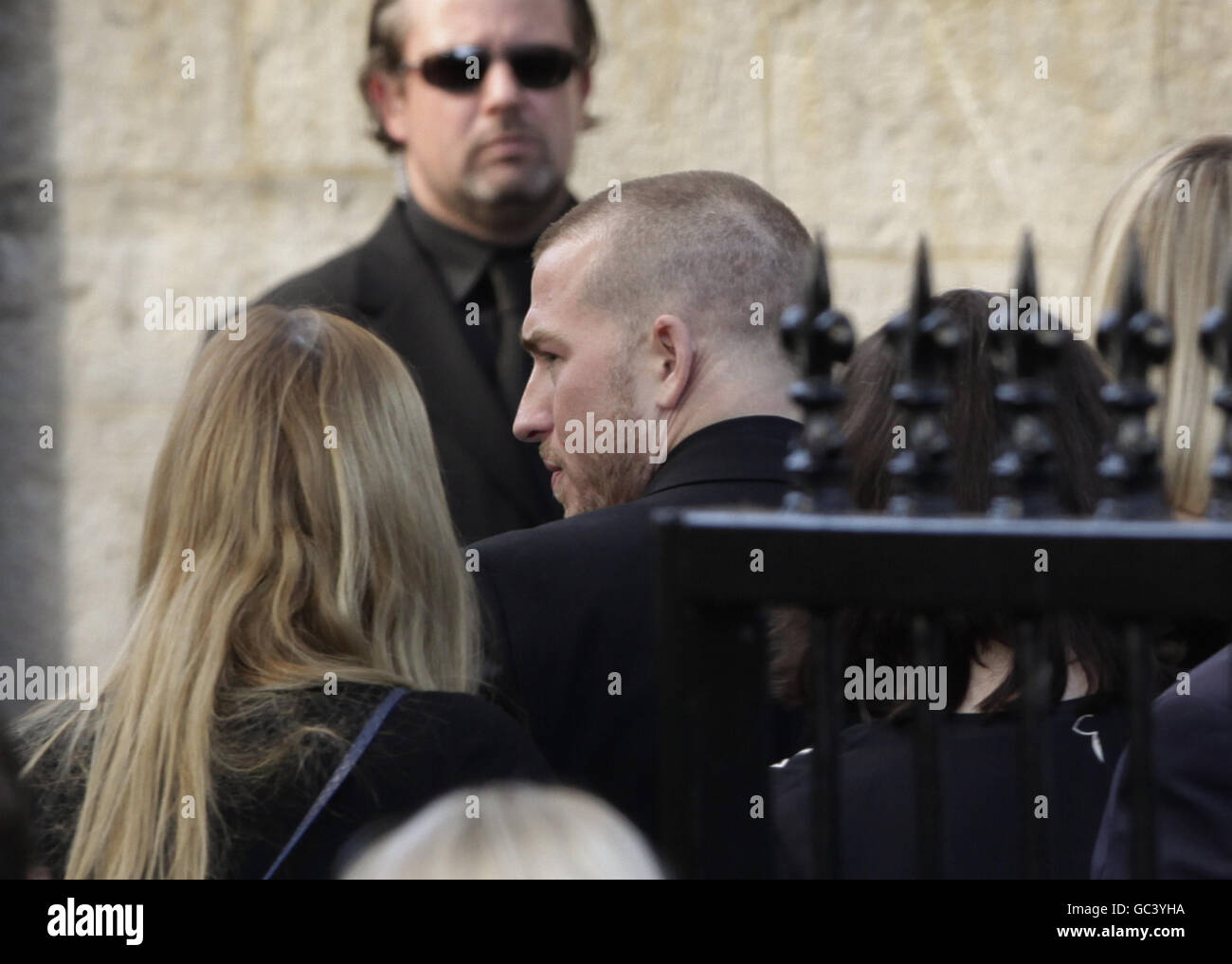 Stephen Gately's partner Andrew Cowles (centre) arrives at St Laurence ...
