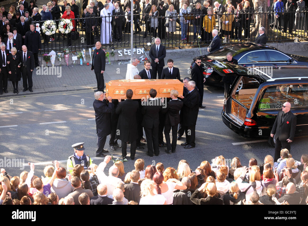 Boyzone members and family carry the coffin of Stephen Gately outside ...