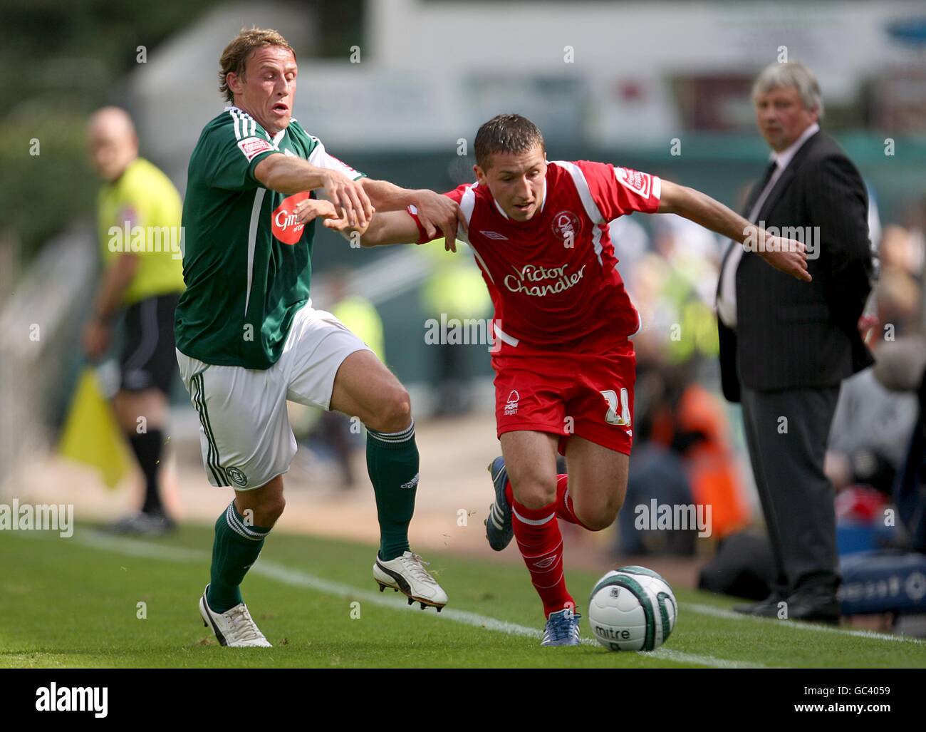 Plymouth Argyle's Chris Clark (left) and Nottingham Forest's Radoslaw ...