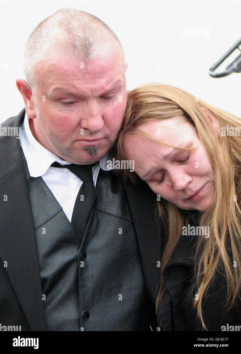 Sally Cranswick, mother of David Barnes, is consoled outside Cardiff ...