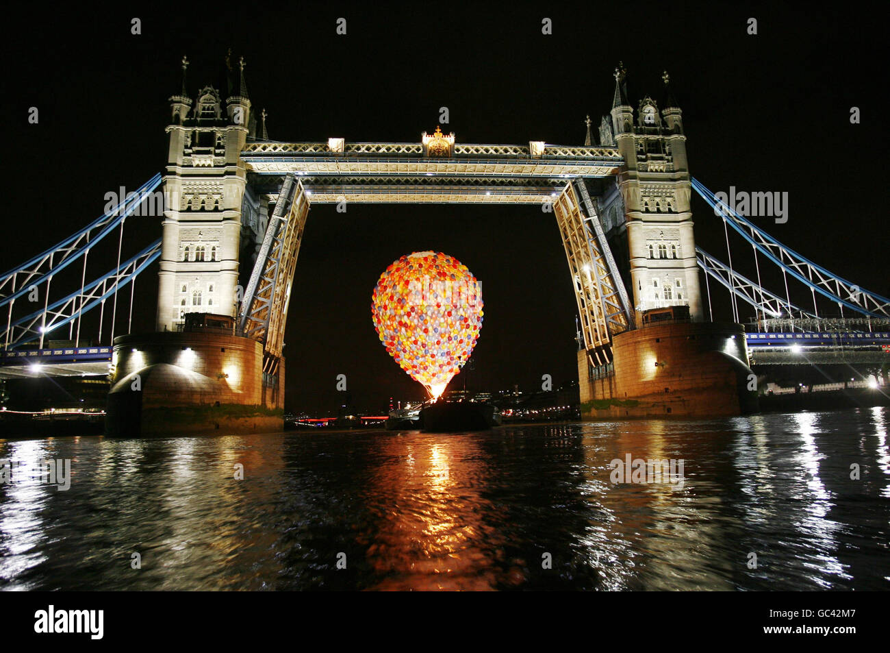 Disney balloon flies through Tower Bridge Stock Photo - Alamy