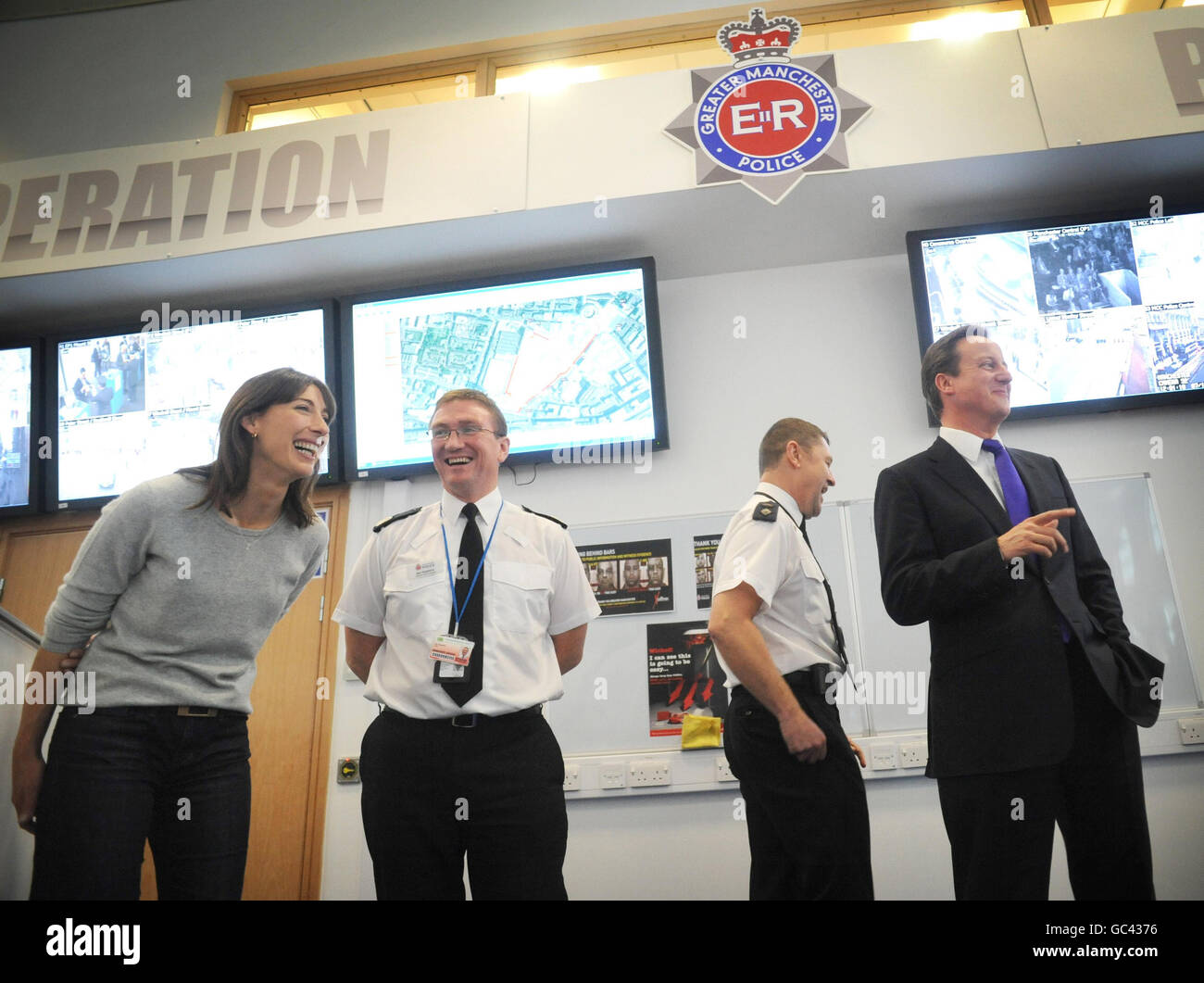 Conservative leader David Cameron and his wife Samantha meet police at ...