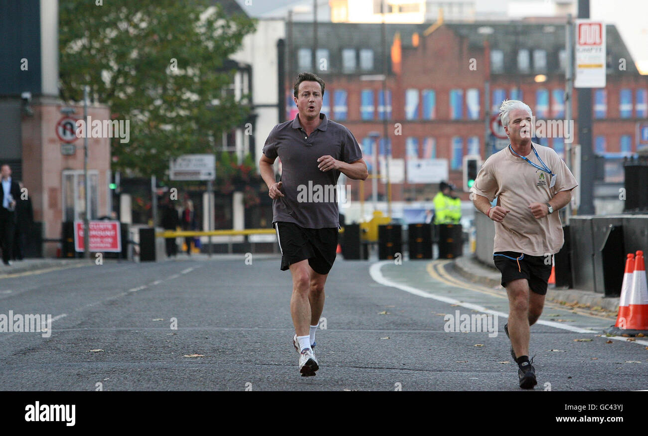 Conservative party leader David Cameron (left) goes for an early ...