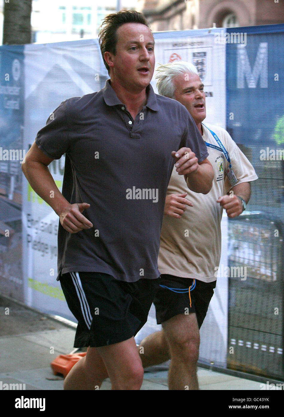Conservative party leader David Cameron goes for an early morning run ...