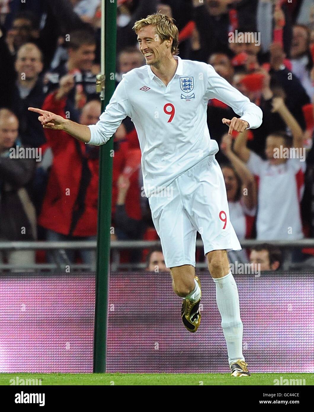 England's Peter Crouch celebrates scoring the opening goal Stock Photo ...