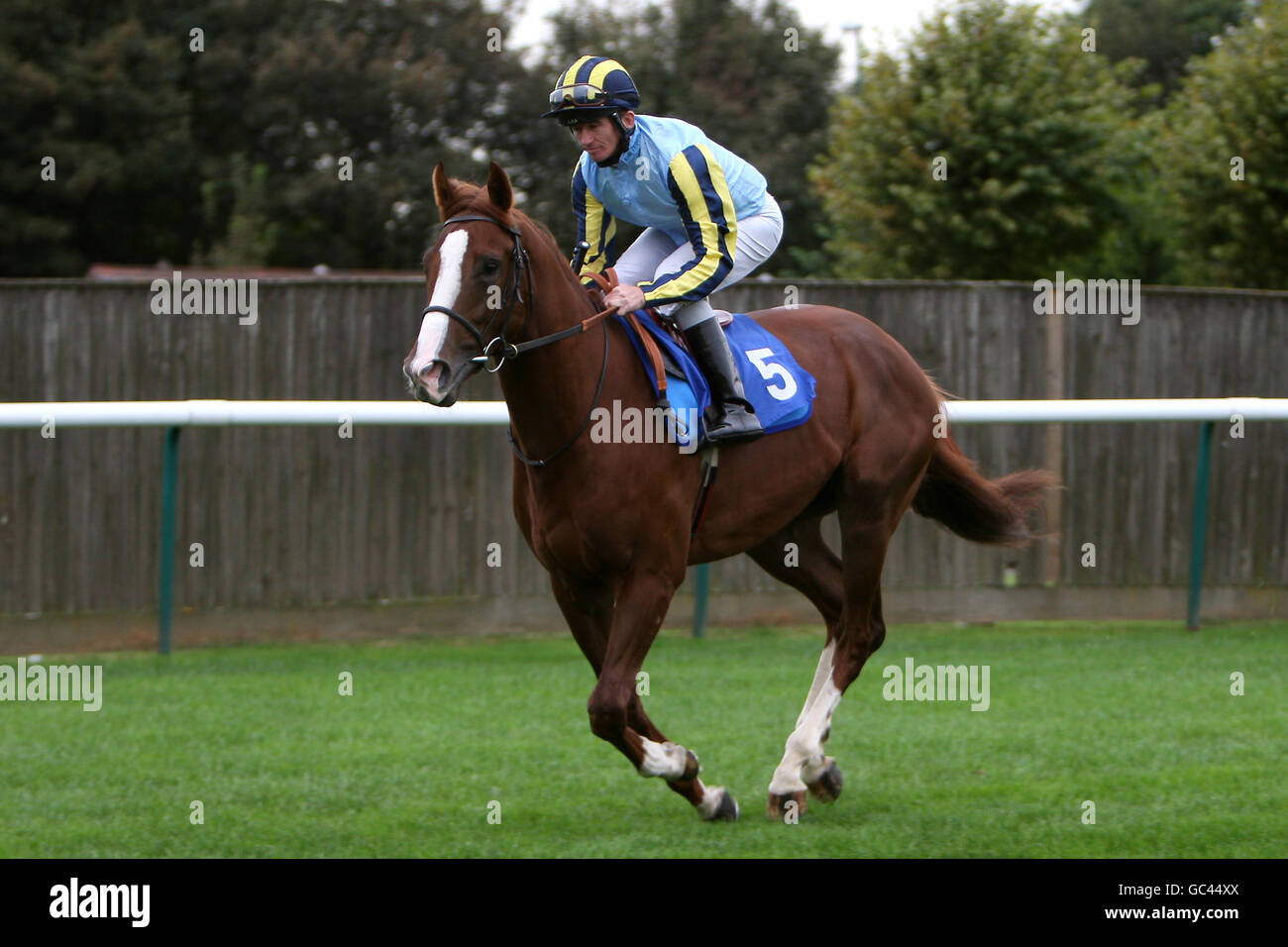 Horse Racing - Nottingham Racecourse. Jockey Tom McLaughlin goes to ...