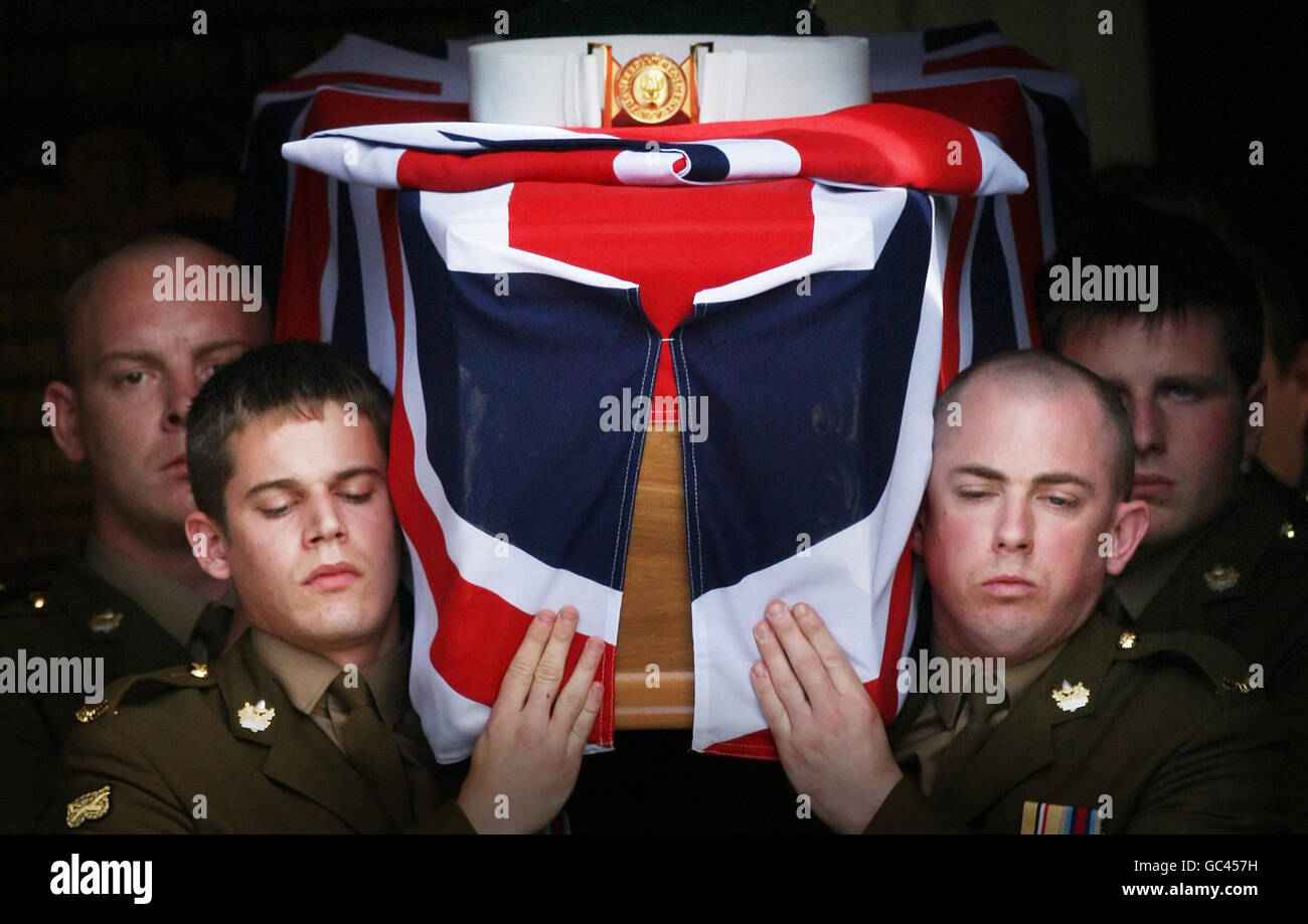 The coffin of Acting Sergeant Michael Lockett is carried from Cathcart ...