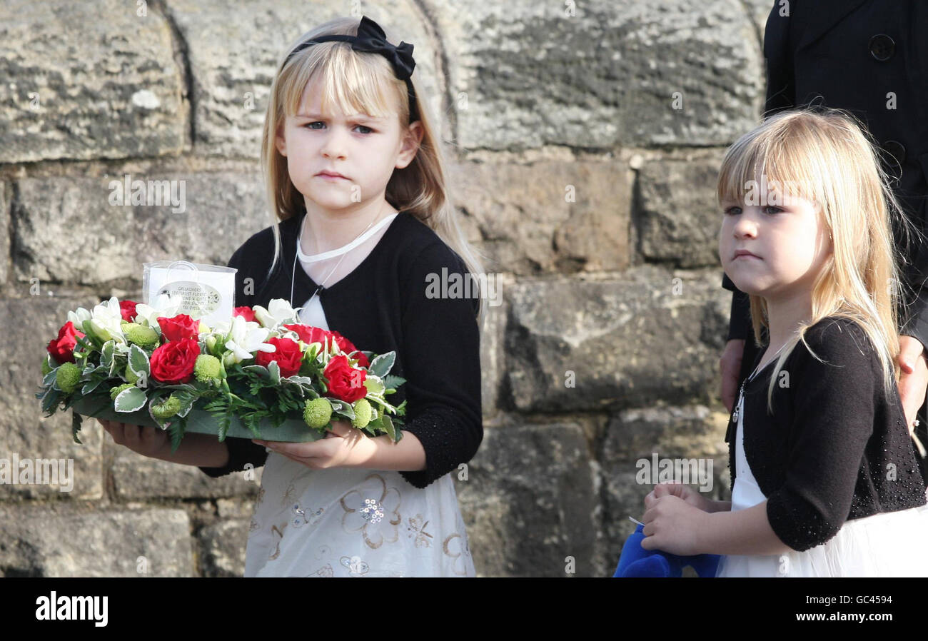 Chloe (left) and Courtney Lockett, children of Acting Sergeant Michael ...