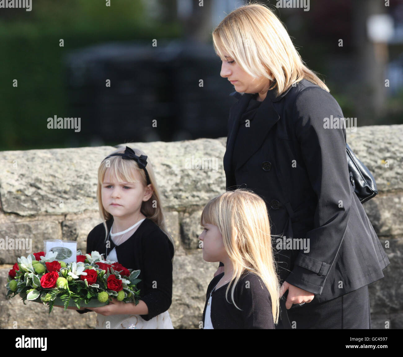 Chloe Lochett (left) and Courtney Lockett, children of acting sergeant ...