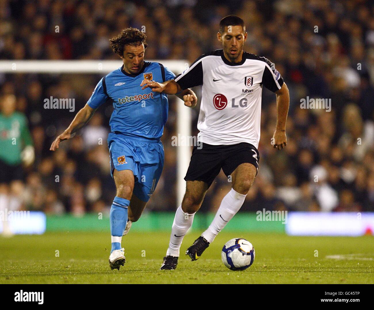 Fulham's Clint Dempsey (right) and Hull City's Stephen Hunt (left ...