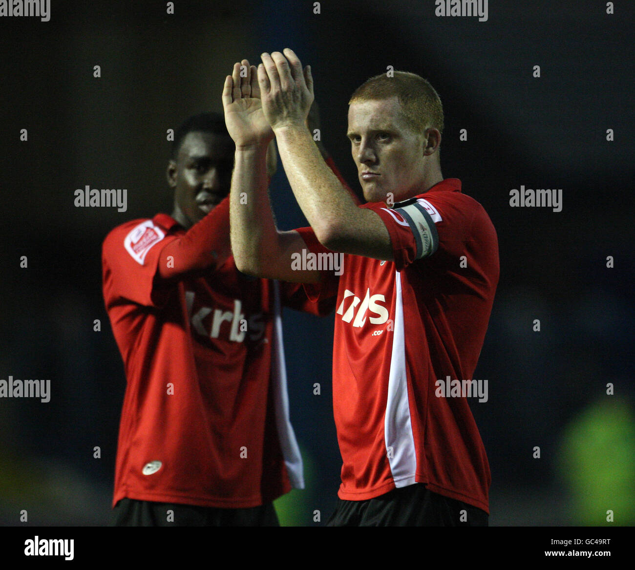Charlton Athletic's Nick Bailey (right) and Lloyd Sam applaud the away ...