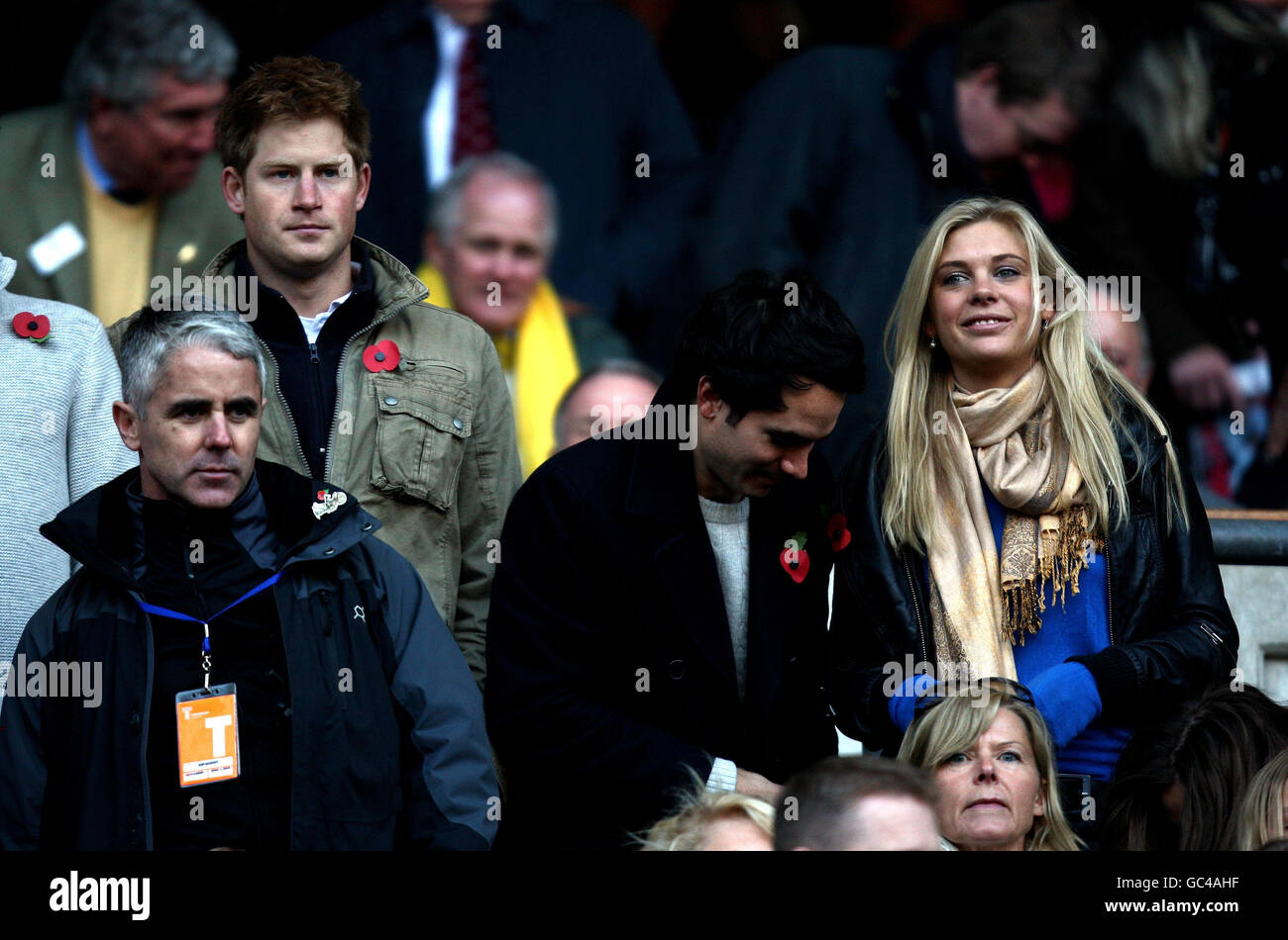 Prince Harry and Chelsy Davy watch from the stands during the Investec ...