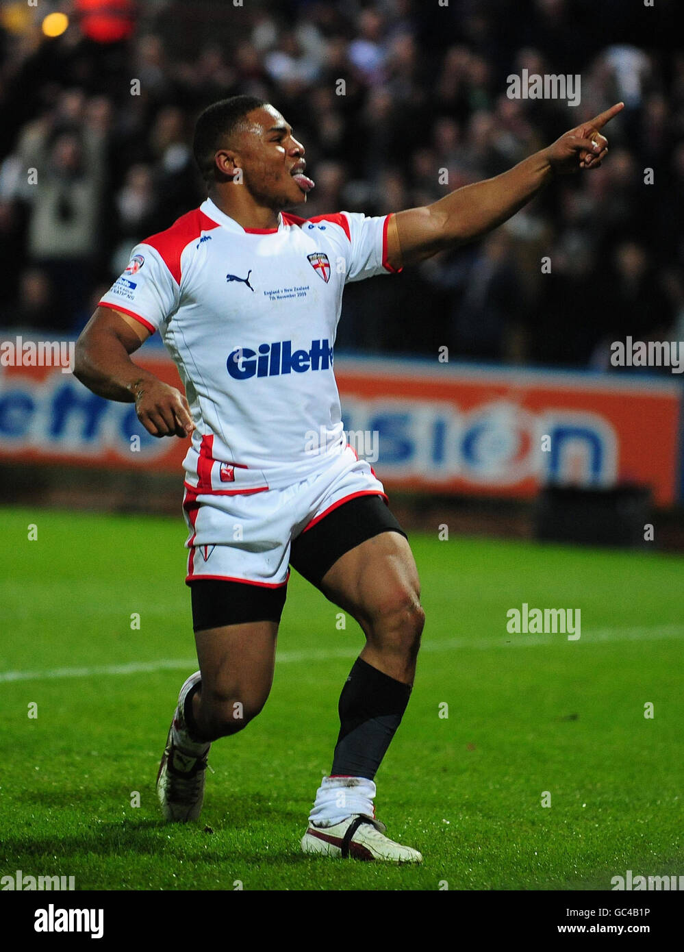 England's Kyle Eastmond celebrates his try during the Gillette Four ...