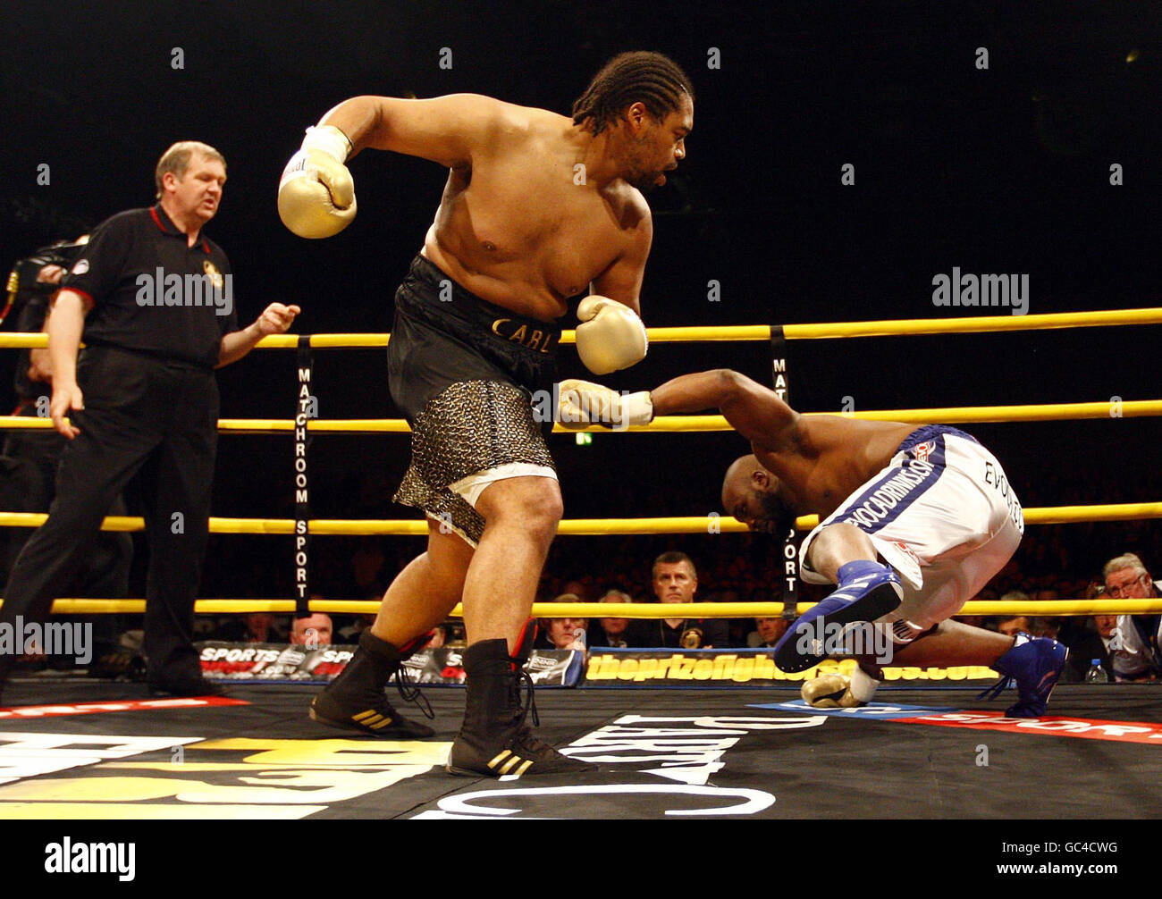 Danny Williams (r) goes down during his defeat to Carl Baker (l) during ...