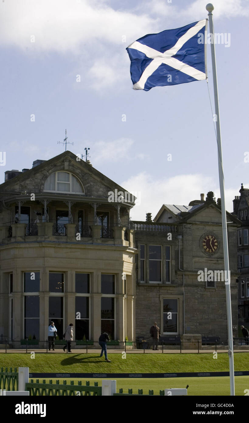 Flags blow in the gale force winds that forced the cancellation of the ...