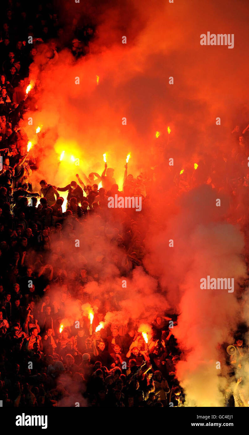 Flares are held by fans in the stands during the FIFA World Cup ...