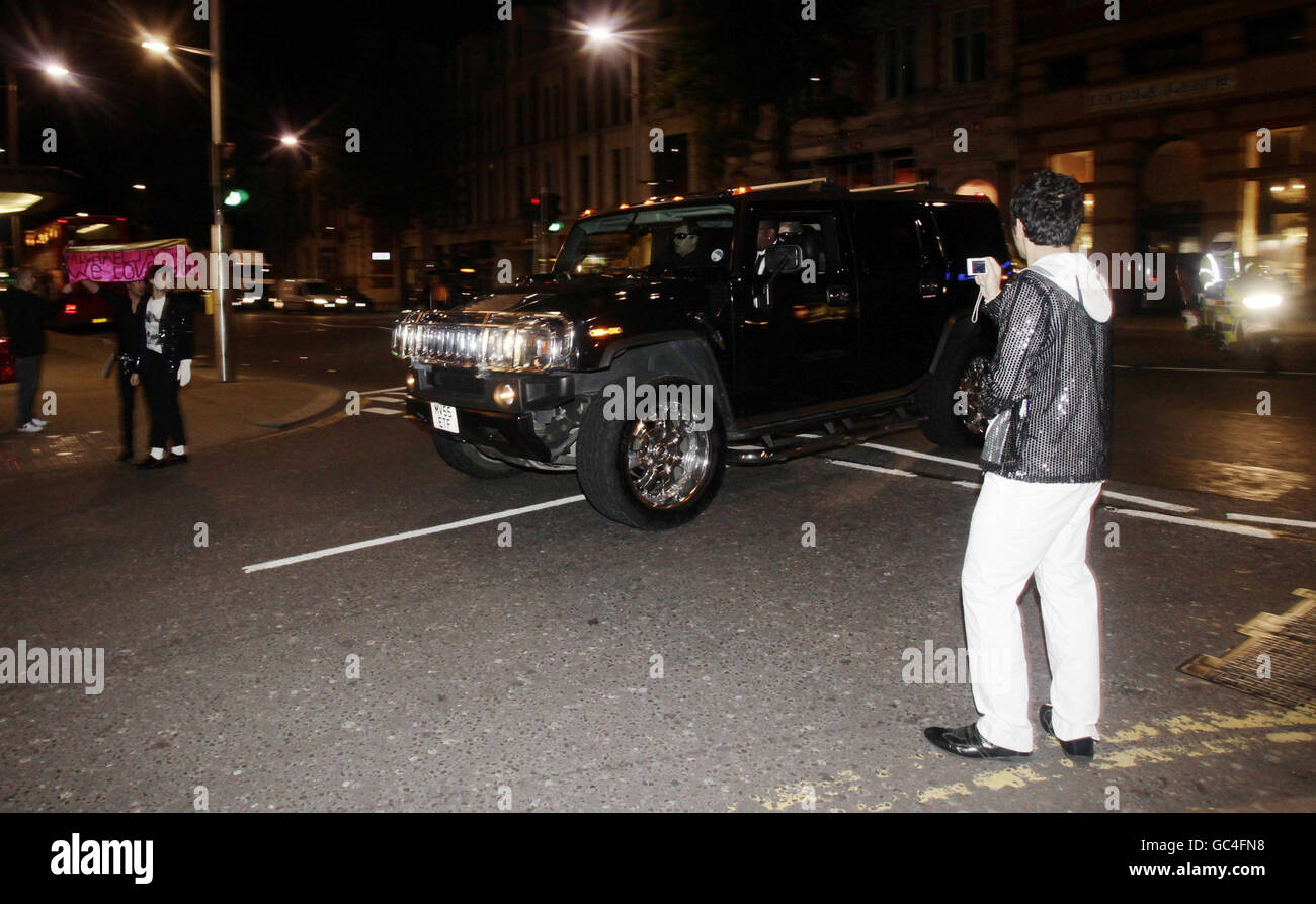 A security convoy arriving to deliver the new Michael Jackson single ...