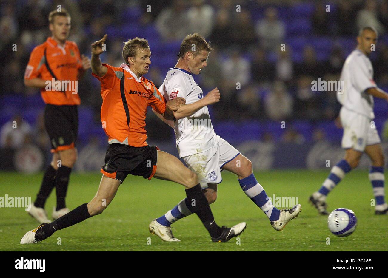 Stockport County's Peter Thompson (left) and Tranmere Rovers' Alan ...