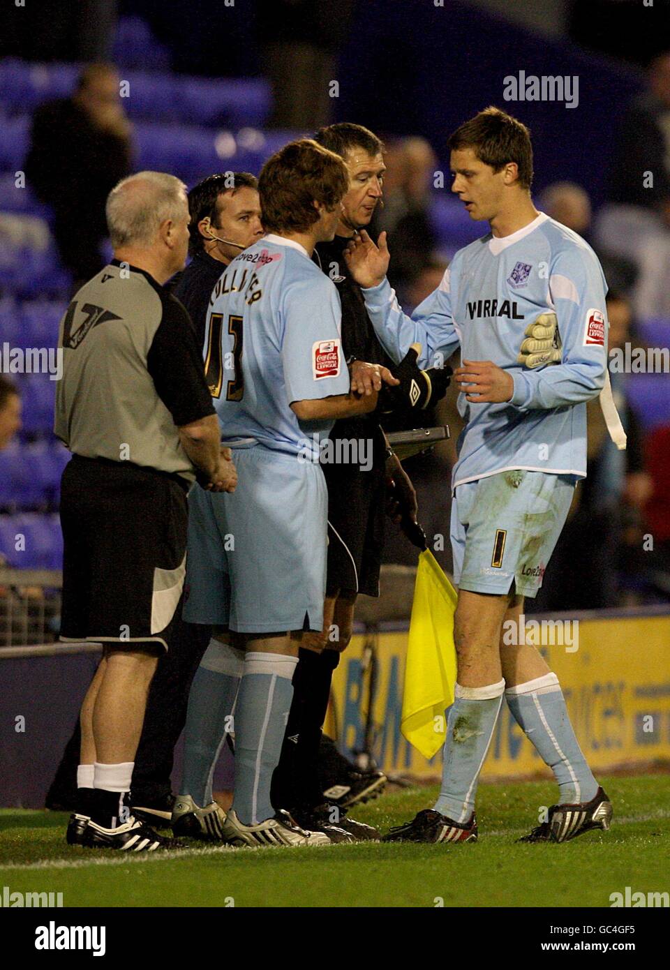 Tranmere Rovers' goalkeeper Luke Daniels (right) is sent off for a foul ...