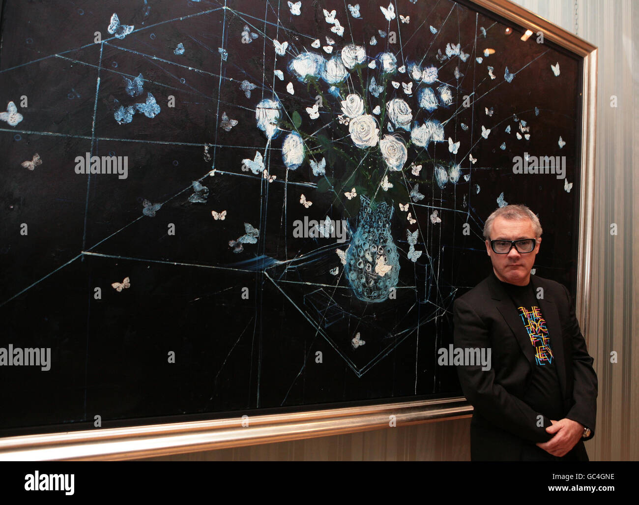 Artist damien hirst with white roses and butterflies 2008 hi-res stock ...