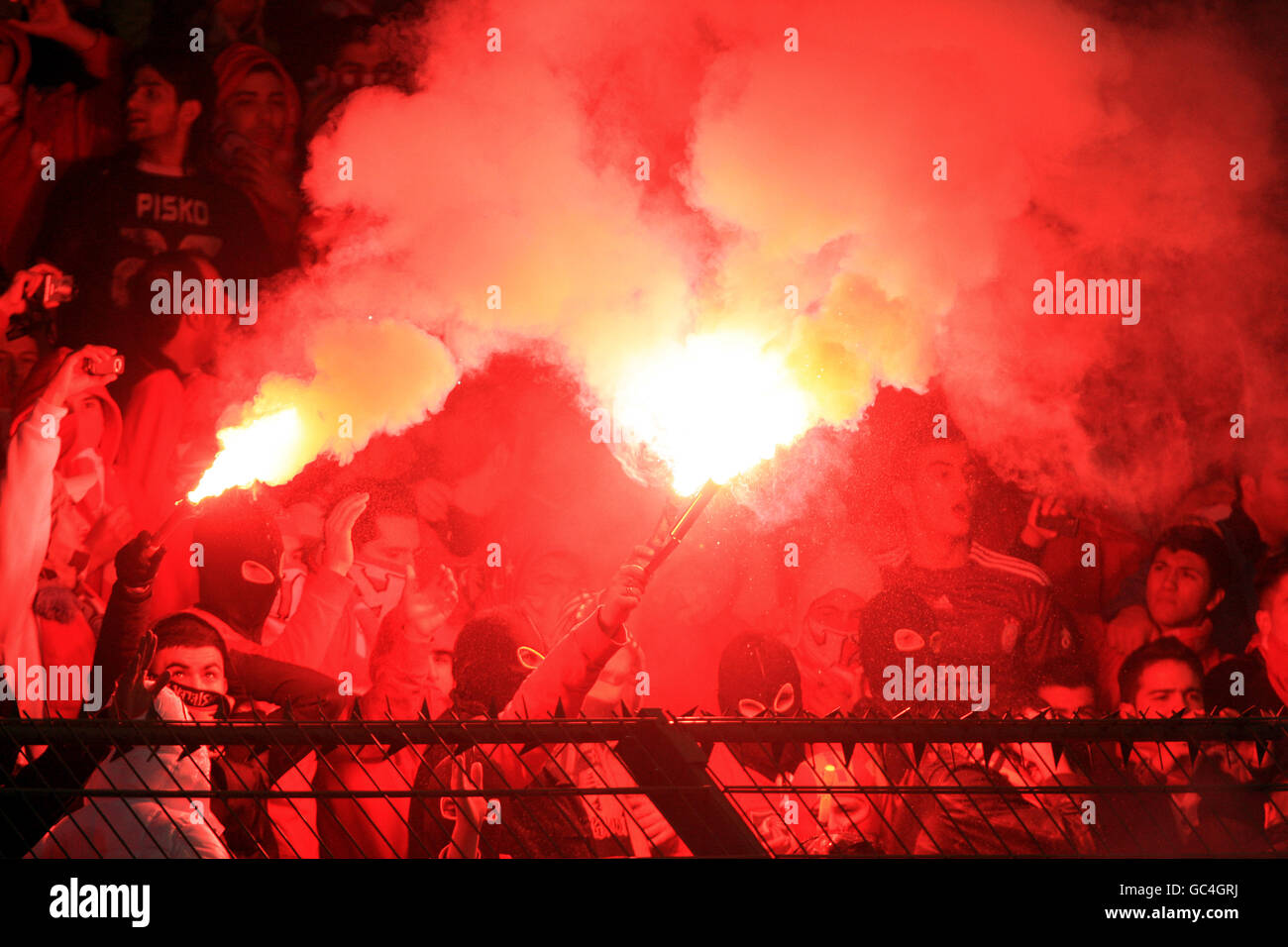Turkish fans let off flares in the stands hi-res stock photography and ...