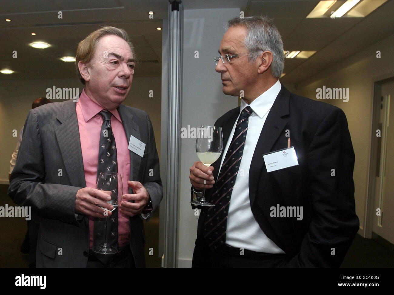 Andrew Lloyd Webber (left) talks to a guest, Martin Dawe, during the ...