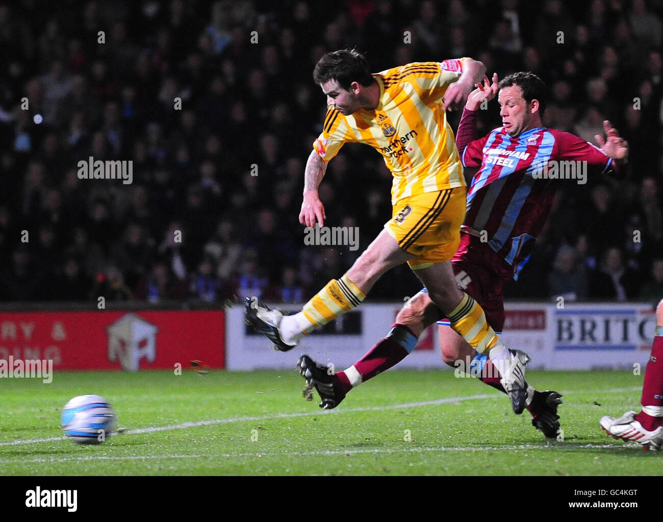 Newcastle United's Danny Guthrie has a shot on goal under pressure from ...