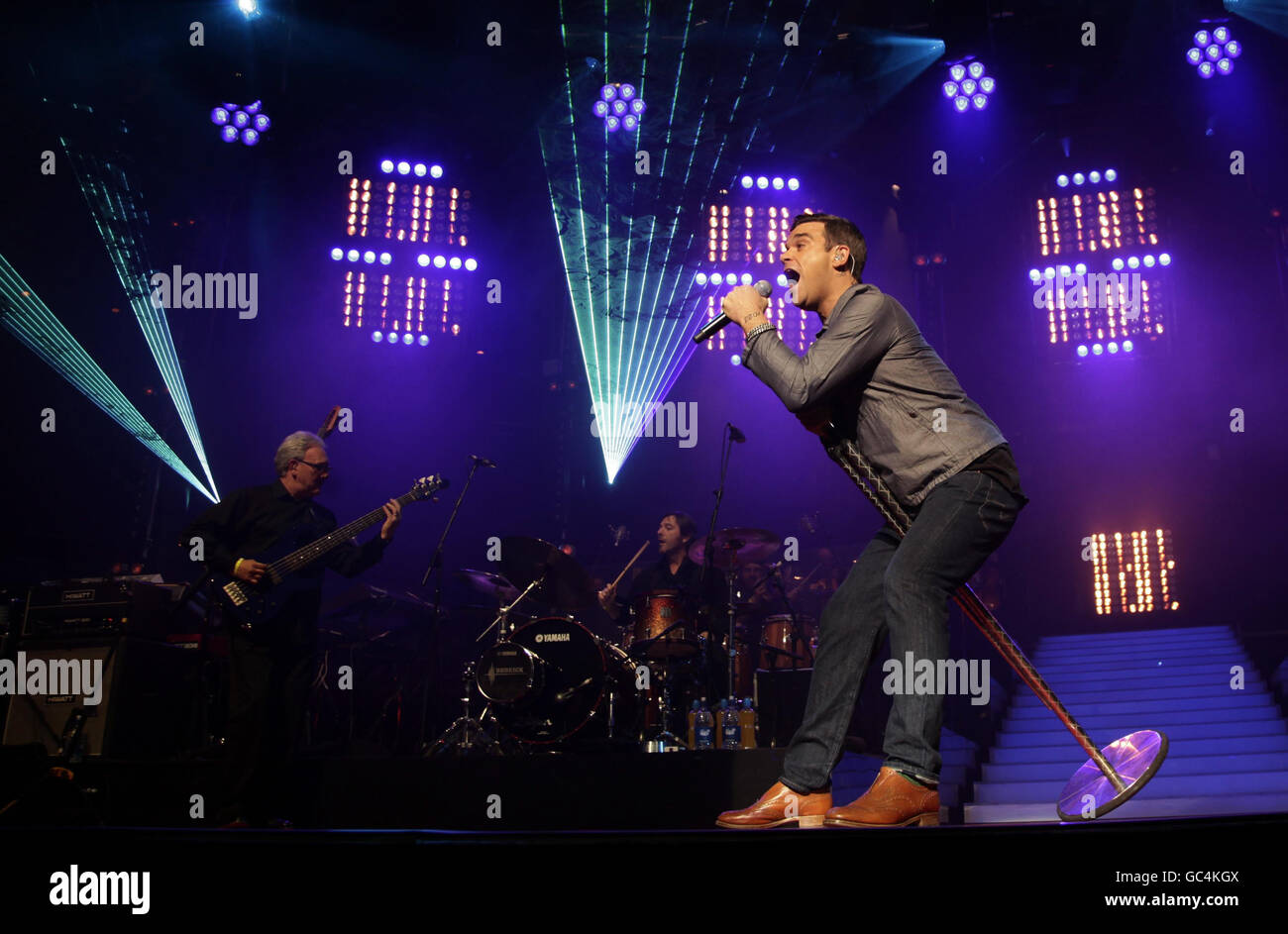 Robbie Williams performing on stage at the BBC Electric Proms, at the ...