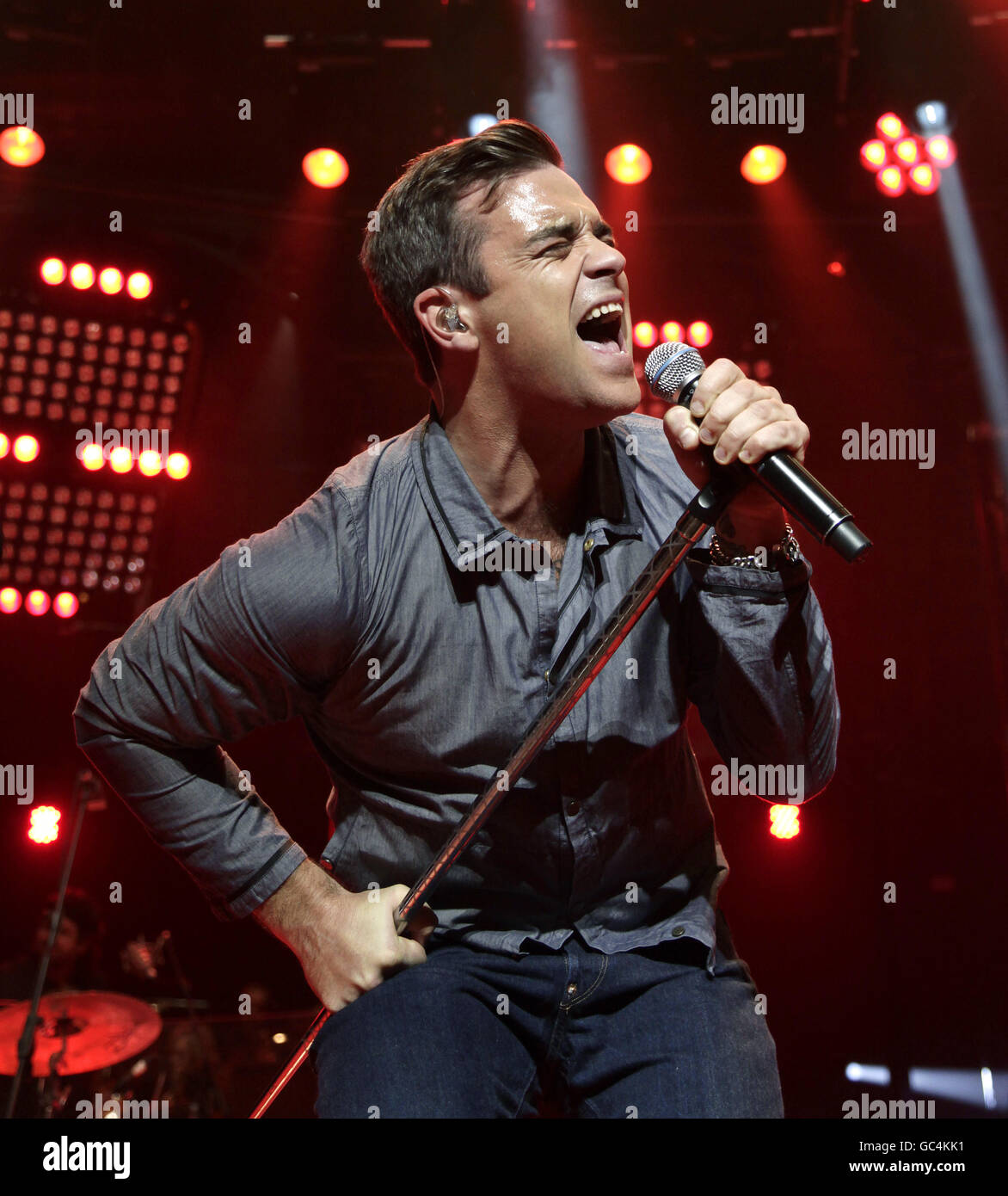 Robbie williams on stage in hi-res stock photography and images - Alamy