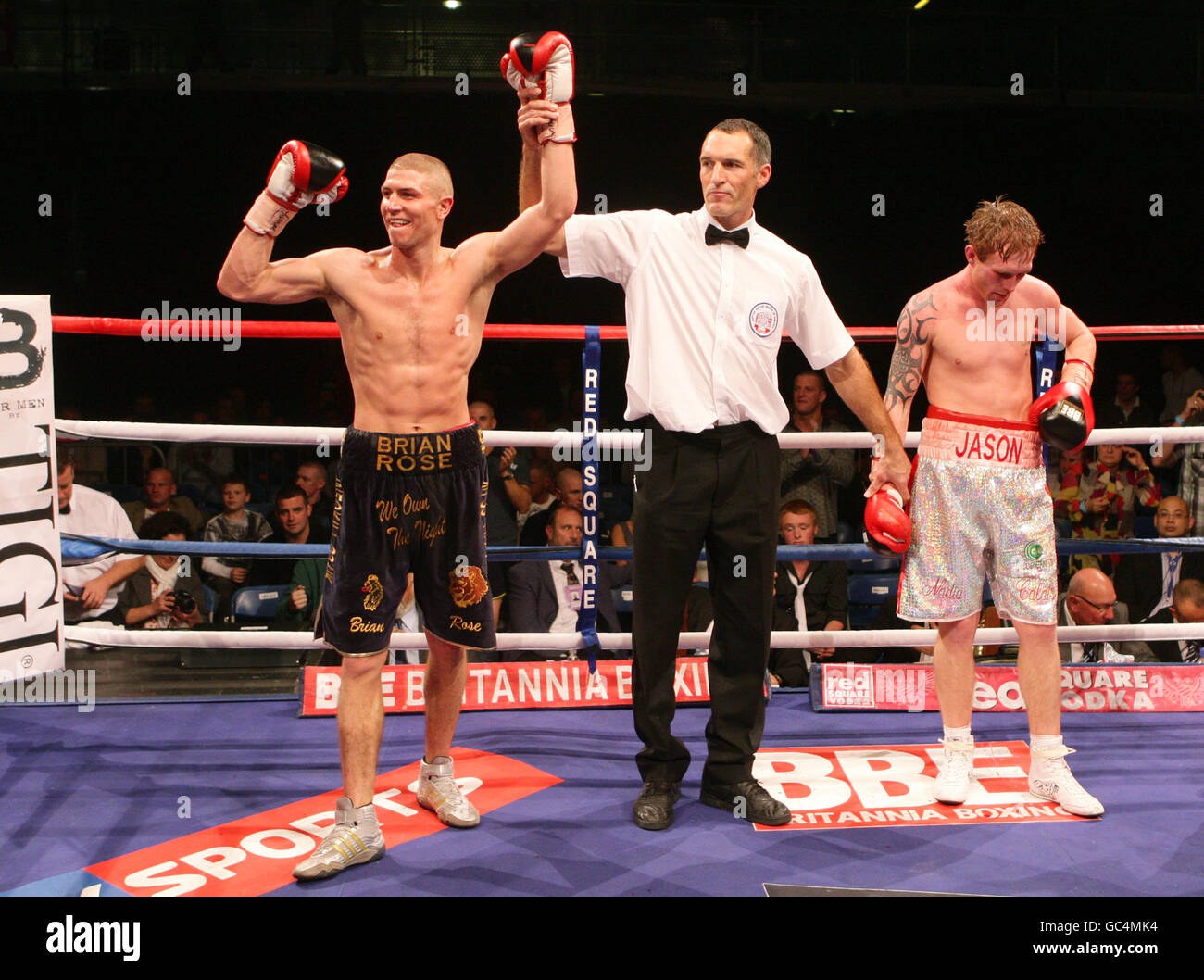 Jason Rushton (right) stands dejected as Brian Rose stands victorious ...