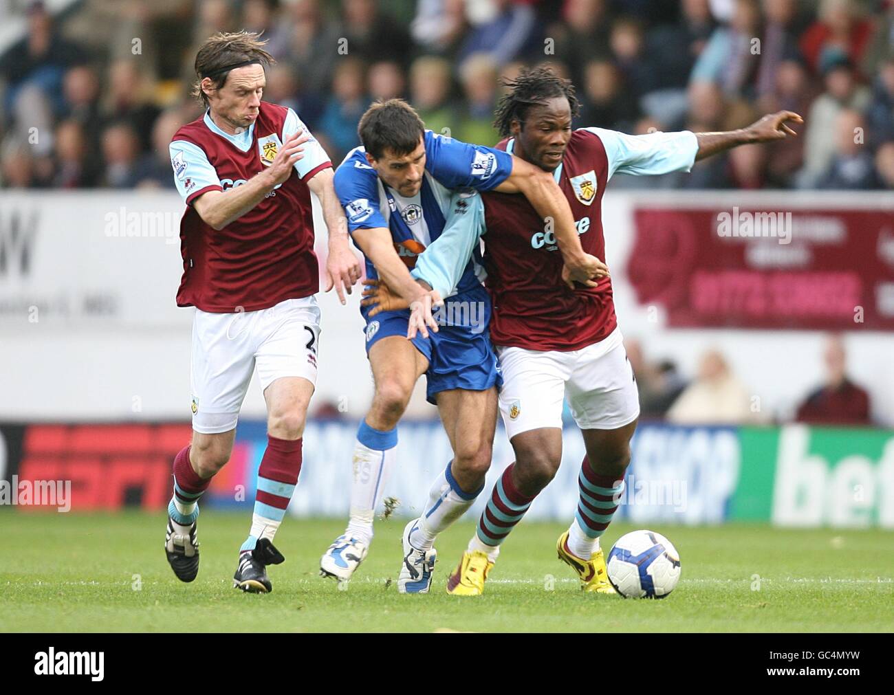 Burnley's Graham Alexander (left) and Andre Stephane Bikey (right ...