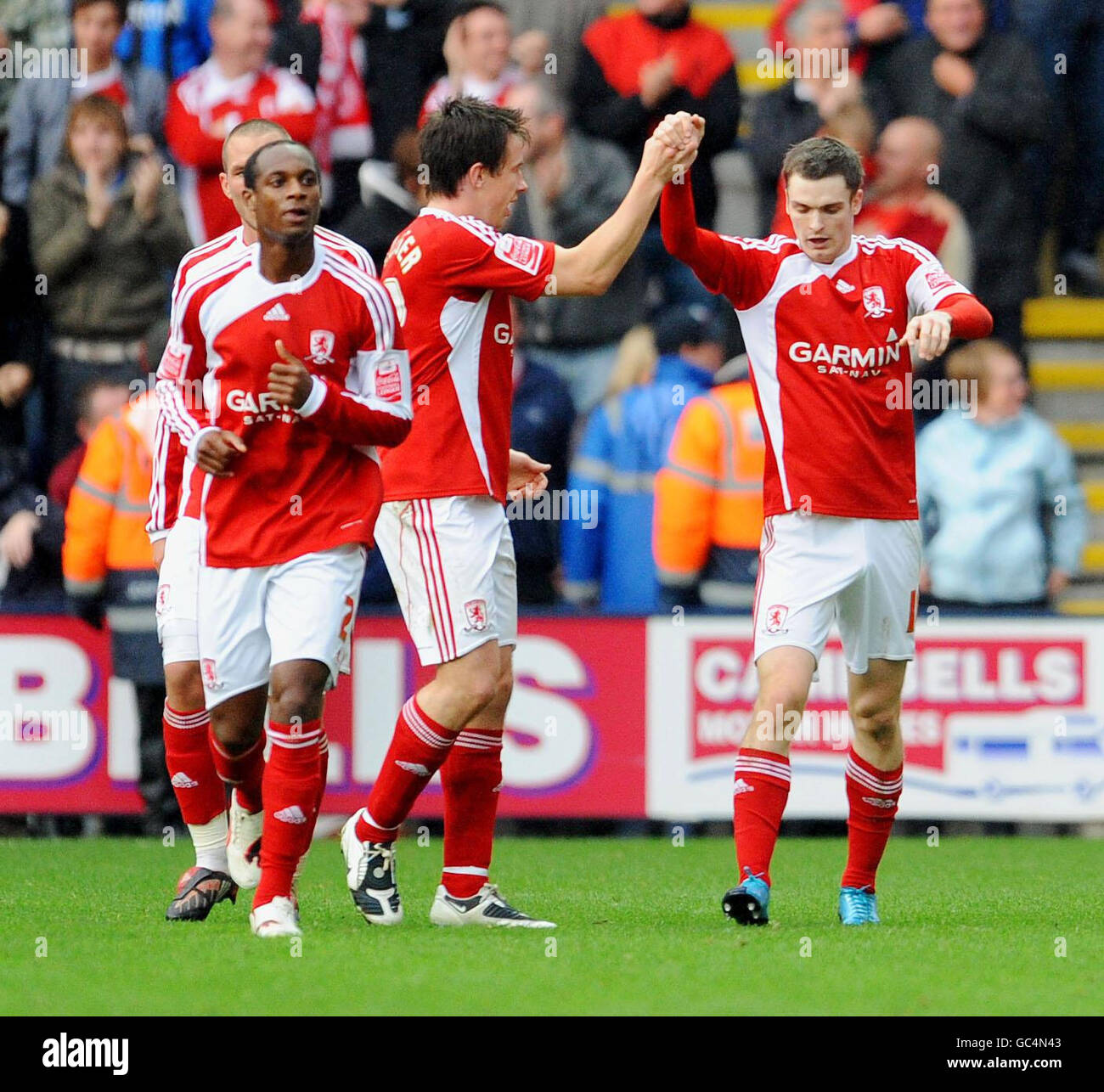 Middlesbrough's Adam Johnson (right) celebrates with his team-mates ...