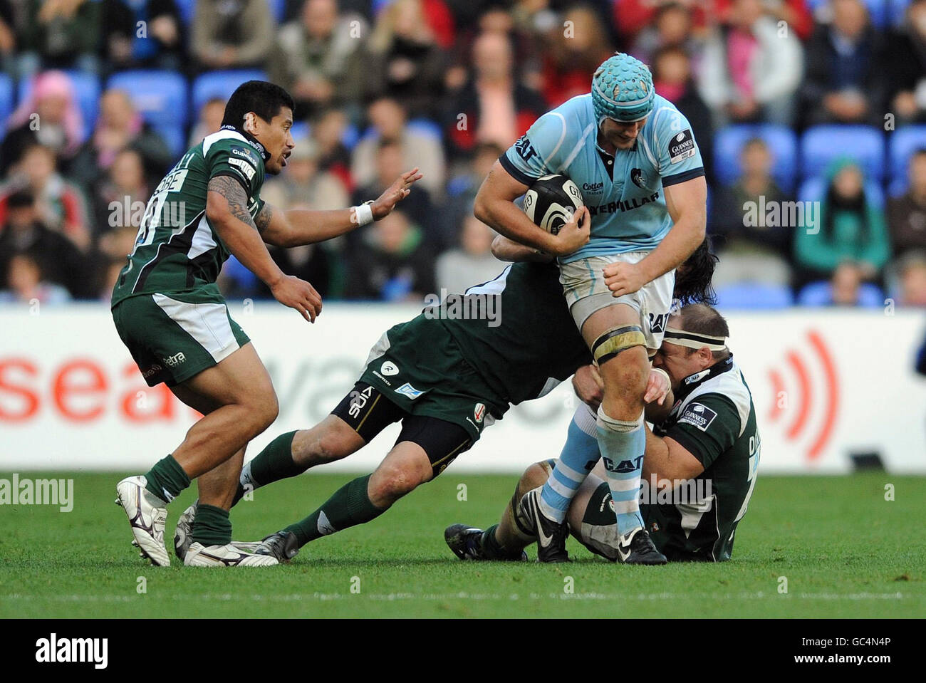 London Irish's Clarke Dermody (right) and Danie Coetzee (second left ...