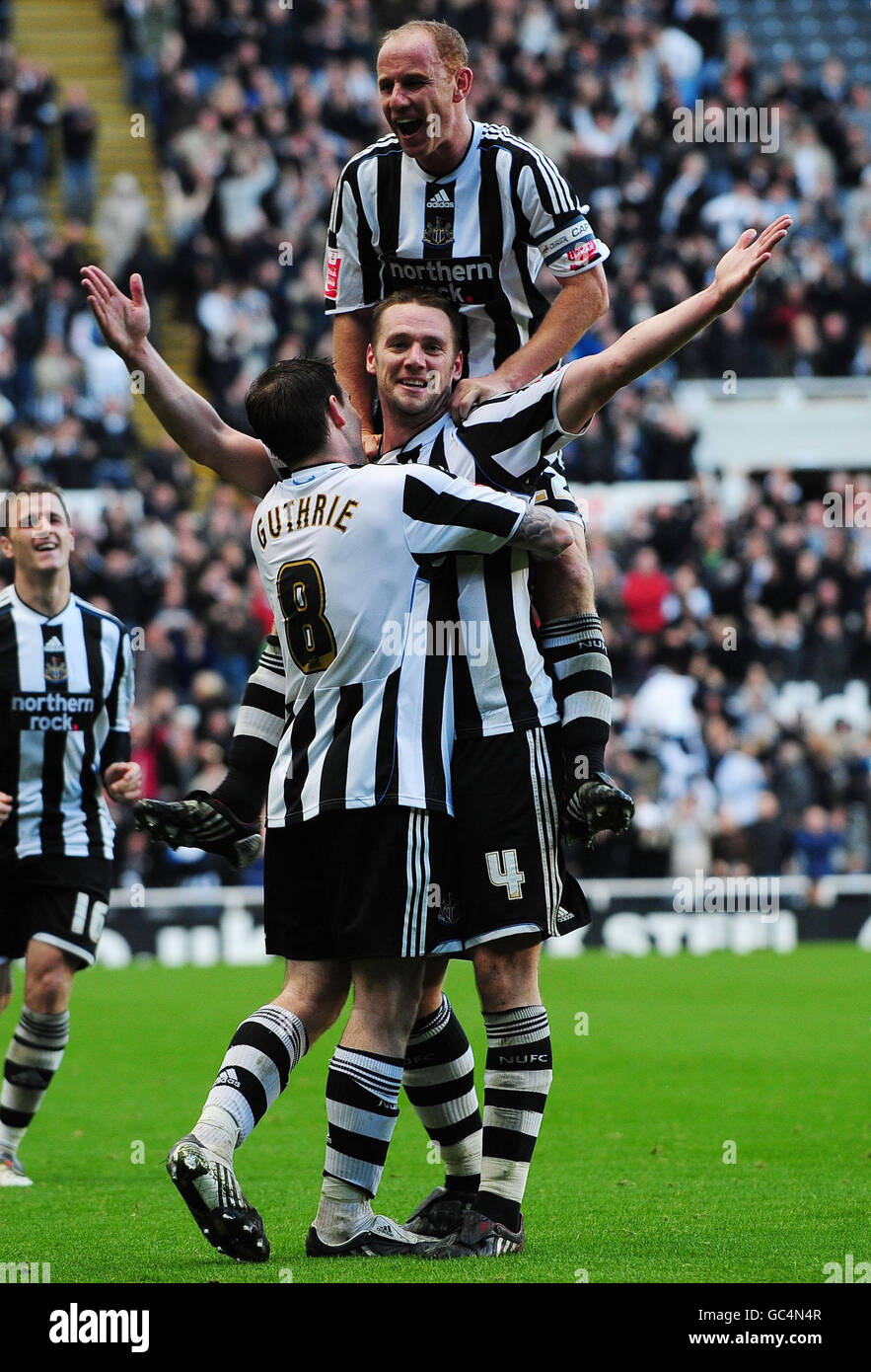 Newcastle's Kevin Nolan celebrates his goal with Nicky Butt (top) and ...