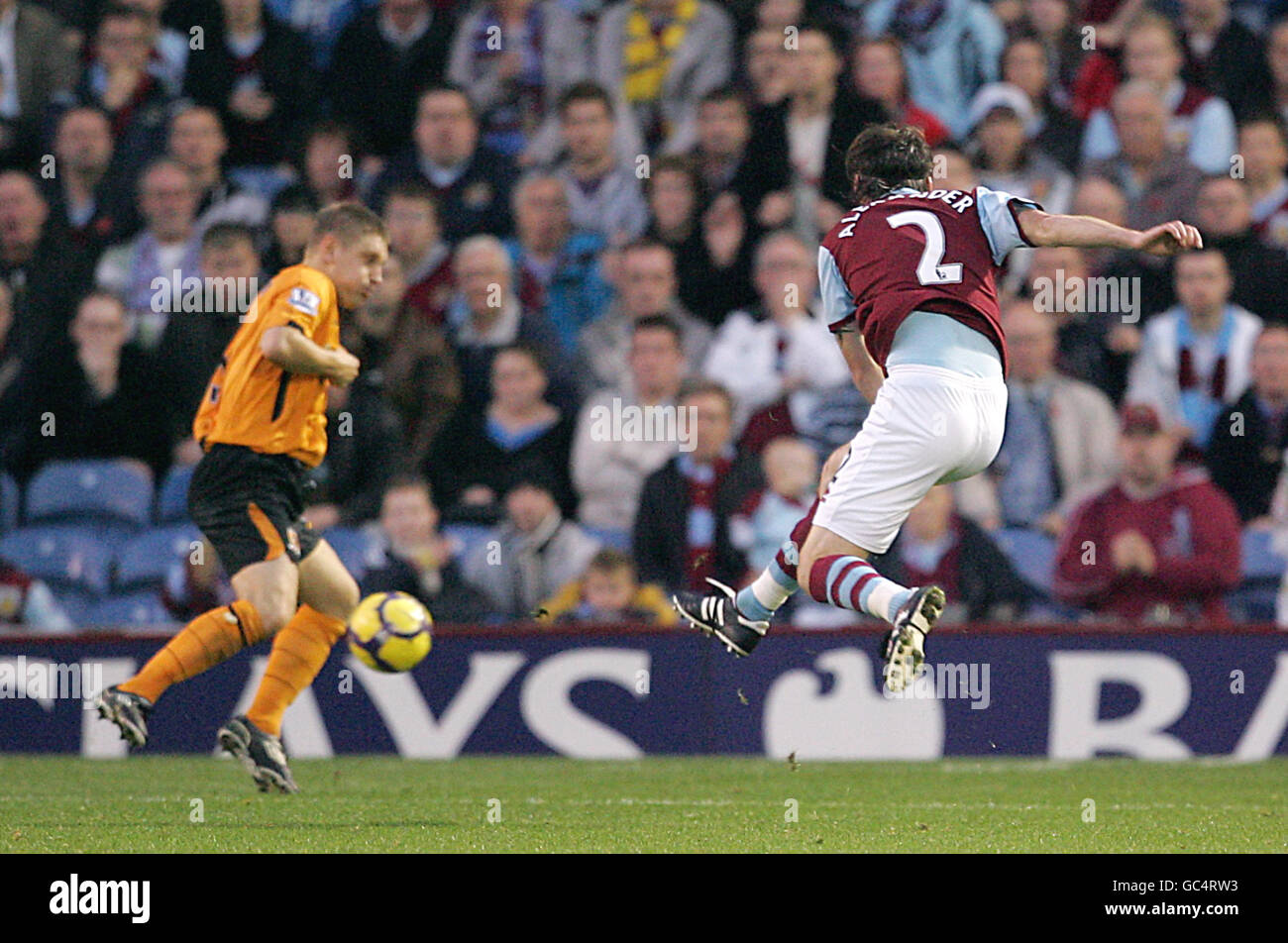 Burnley's Graham Alexander (right) scores his and his sides second goal ...