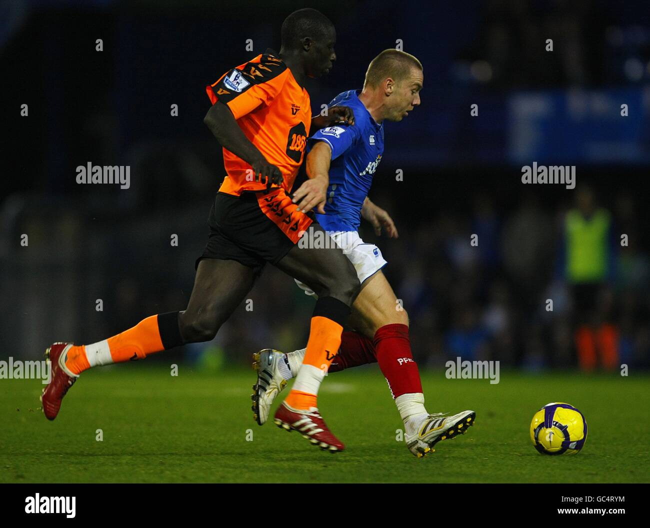 Wigan Athletic's Emmerson Boyce (left) and Portsmouth's Jamie O'Hara ...